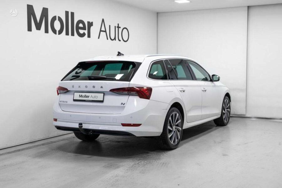 White Skoda Octavia 2022 in Vilnius, with an engine capacity of 1.40 L and mileage of 137 thousand km for 17950 €, photo 4 on AUTOMOTO.COM.LV