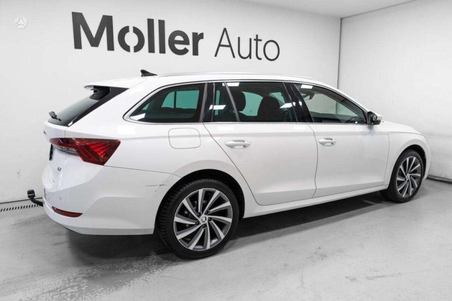 White Skoda Octavia 2022 in Vilnius, with an engine capacity of 1.40 L and mileage of 137 thousand km for 17950 €, photo 5 on AUTOMOTO.COM.LV