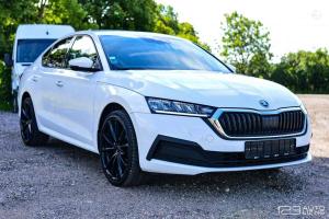 White Skoda Octavia 2023 in Kretinga, with an engine capacity of 2.00 L and mileage of 189 thousand km for 17999 €, photo 5 on AUTOMOTO.COM.LV