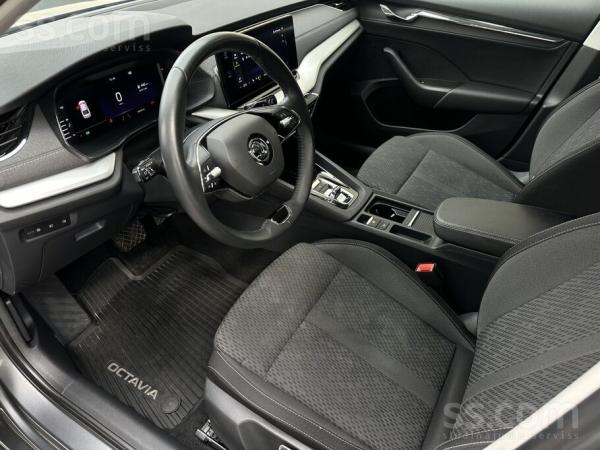 White Skoda Octavia 2023 in Riga, with an engine capacity of 2.00 L and mileage of 61 thousand km for 21550 €, photo 7 on AUTOMOTO.COM.LV
