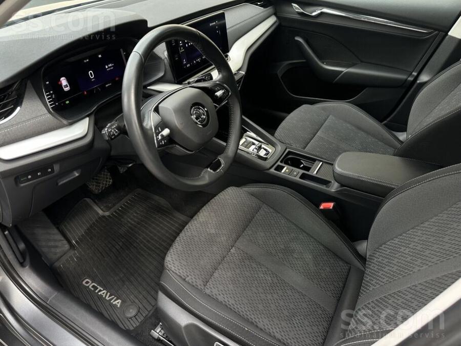 White Skoda Octavia 2023 in Riga, with an engine capacity of 2.00 L and mileage of 61 thousand km for 21550 €, photo 8 on AUTOMOTO.COM.LV