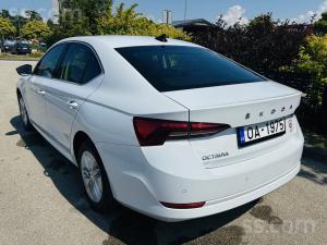White Skoda Octavia 2023 in Ogre, with an engine capacity of 2.00 L and mileage of 77 thousand km for 15950 €, photo 4 on AUTOMOTO.COM.LV