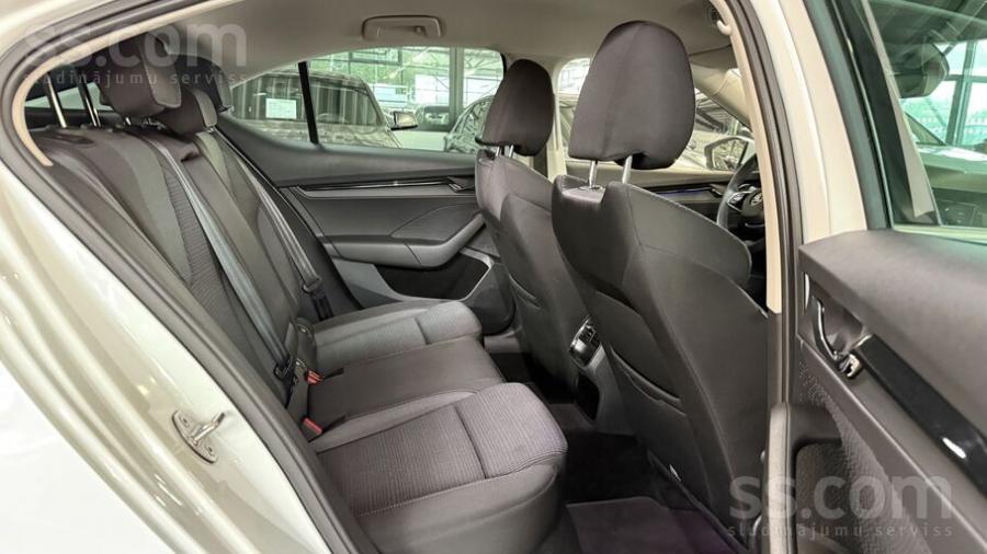 White Skoda Octavia 2024 in Riga, with an engine capacity of 2.00 L and mileage of 81 thousand km for 16900 €, photo 15 on AUTOMOTO.COM.LV