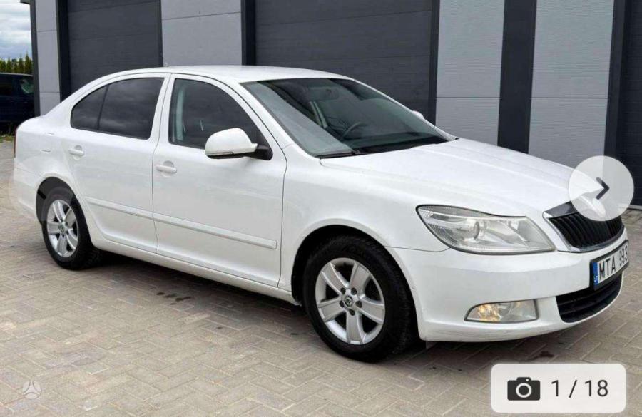 White Skoda Octavia 2011 in Vilnius, with an engine capacity of 2.00 L and mileage of 397 thousand km for 1950 €, photo 4 on AUTOMOTO.COM.LV