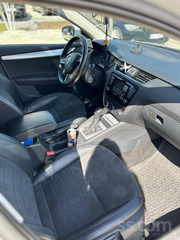 White Skoda Octavia 2013 in Riga, with an engine capacity of 2.00 L and mileage of 268 thousand km for 6900 €, photo 4 on AUTOMOTO.COM.LV