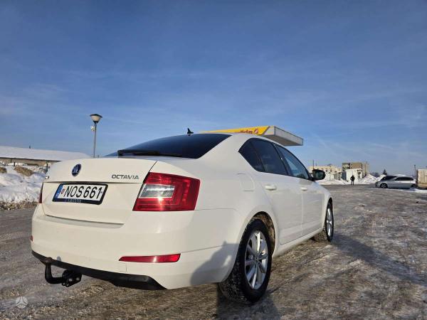 White Skoda Octavia 2016 in Kretinga, with an engine capacity of 1.60 L and mileage of 223 thousand km for 4950 €, photo 4 on AUTOMOTO.COM.LV