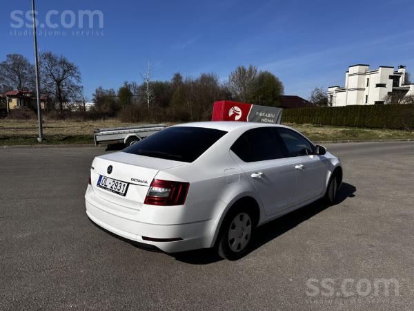 White Skoda Octavia 2018 in Riga, with an engine capacity of 1.60 L and mileage of 358 thousand km for 5900 €, photo 4 on AUTOMOTO.COM.LV