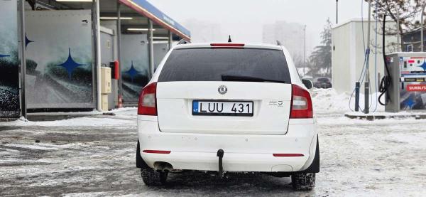 White Skoda Octavia 2011 in Vilnius, with an engine capacity of 1.97 L and mileage of 366 thousand km for 2300 €, photo 5 on AUTOMOTO.COM.LV
