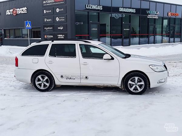 White Skoda Octavia 2011 in Siauliai, with an engine capacity of 2.00 L and mileage of 260 thousand km for 3400 €, photo 9 on AUTOMOTO.COM.LV