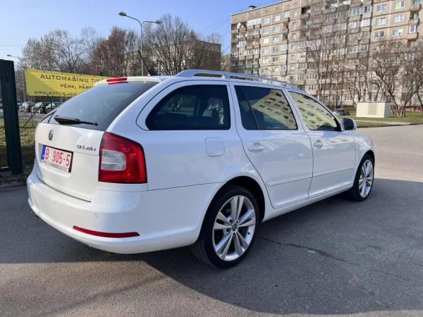 White Skoda Octavia 2011 in Riga, with an engine capacity of 2.00 L and mileage of 211 thousand km for 7550 €, photo 4 on AUTOMOTO.COM.LV