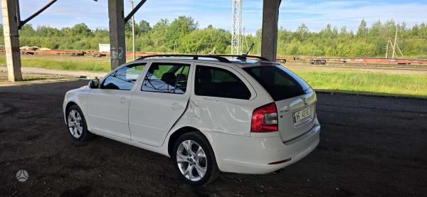 White Skoda Octavia 2011 in Utena, with an engine capacity of 1.60 L and mileage of 188 thousand km for 2990 €, photo 7 on AUTOMOTO.COM.LV