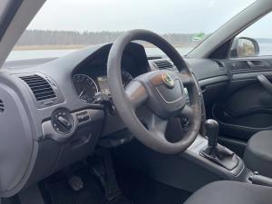 White Skoda Octavia 2012 in Riga, with an engine capacity of 1.60 L and mileage of 225 thousand km for 3900 €, photo 9 on AUTOMOTO.COM.LV