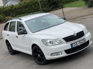 White Skoda Octavia 2012 in Riga, with an engine capacity of 1.60 L and mileage of 225 thousand km for 3900 €, photo 16 on AUTOMOTO.COM.LV