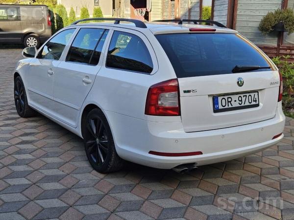 White Skoda Octavia 2012 in Talsi, with an engine capacity of 2.00 L and mileage of 181 thousand km for 6299 €, photo 3 on AUTOMOTO.COM.LV