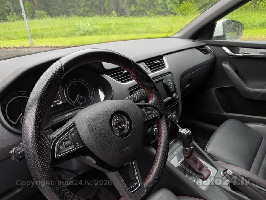 White Skoda Octavia 2013 in Tallinn, with an engine capacity of 2.00 L and mileage of 185 thousand km for 10800 €, photo 7 on AUTOMOTO.COM.LV