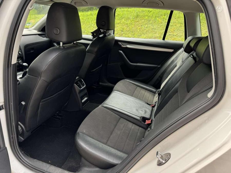 White Skoda Octavia 2013 in Alytus, with an engine capacity of 2.00 L and mileage of 347 thousand km for 4450 €, photo 11 on AUTOMOTO.COM.LV