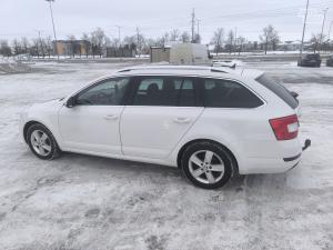 White Skoda Octavia 2014 in Siauliai, with an engine capacity of 1.80 L and mileage of 239 thousand km for 7600 €, photo 4 on AUTOMOTO.COM.LV