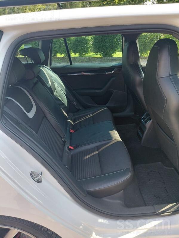 White Skoda Octavia 2014 in Saldus, with an engine capacity of 2.00 L and mileage of 329 thousand km for 7800 €, photo 8 on AUTOMOTO.COM.LV