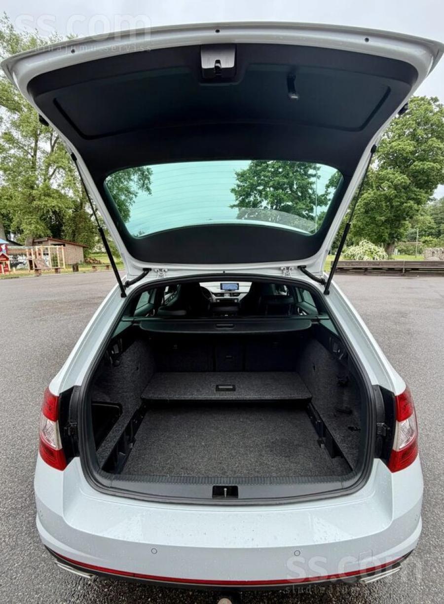 White Skoda Octavia 2014 in Riga, with an engine capacity of 2.00 L and mileage of 248 thousand km for 9450 €, photo 8 on AUTOMOTO.COM.LV