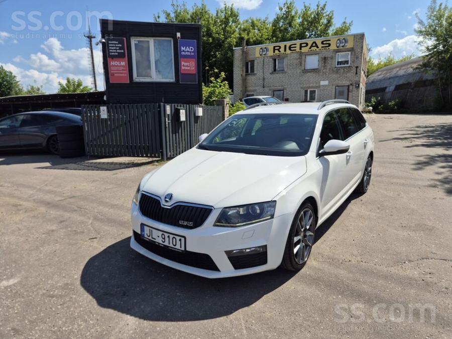 White Skoda Octavia 2014 in Riga, with an engine capacity of 2.00 L and mileage of 231 thousand km for 9990 €, photo 1 on AUTOMOTO.COM.LV