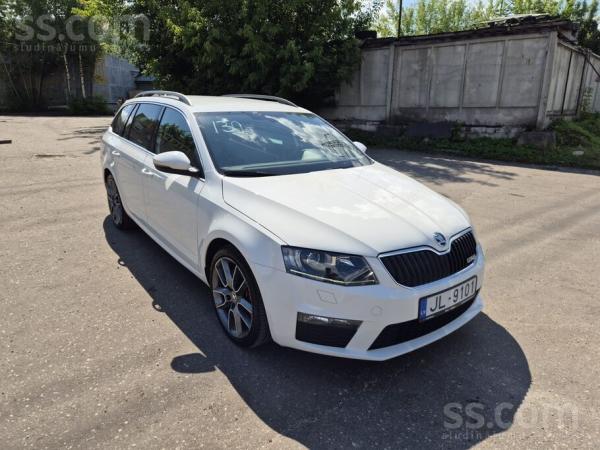 White Skoda Octavia 2014 in Riga, with an engine capacity of 2.00 L and mileage of 231 thousand km for 9990 €, photo 2 on AUTOMOTO.COM.LV