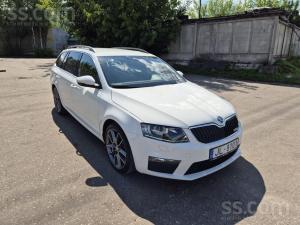 White Skoda Octavia 2014 in Riga, with an engine capacity of 2.00 L and mileage of 231 thousand km for 9990 €, photo 3 on AUTOMOTO.COM.LV