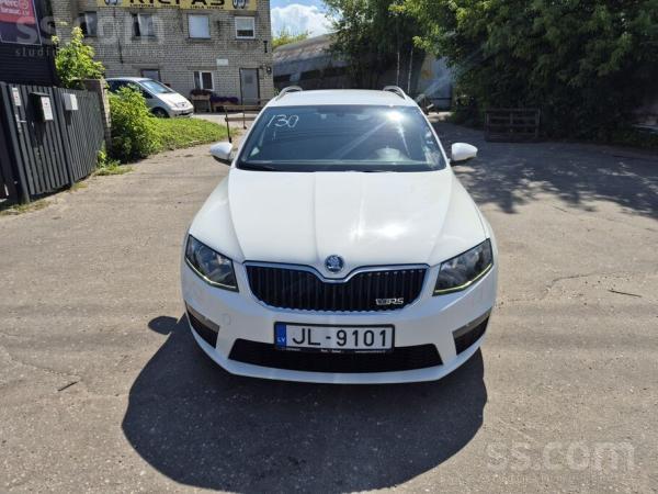 White Skoda Octavia 2014 in Riga, with an engine capacity of 2.00 L and mileage of 231 thousand km for 9990 €, photo 3 on AUTOMOTO.COM.LV