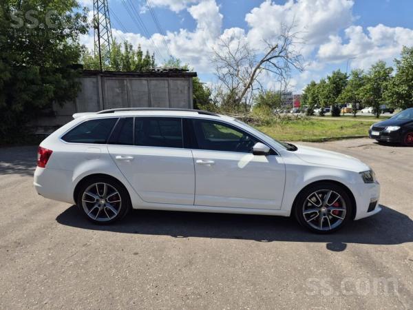 White Skoda Octavia 2014 in Riga, with an engine capacity of 2.00 L and mileage of 231 thousand km for 9990 €, photo 5 on AUTOMOTO.COM.LV