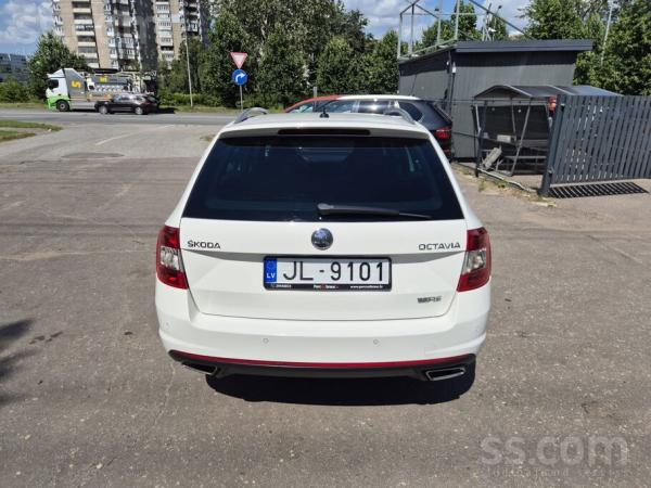 White Skoda Octavia 2014 in Riga, with an engine capacity of 2.00 L and mileage of 231 thousand km for 9990 €, photo 7 on AUTOMOTO.COM.LV