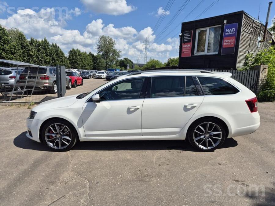 White Skoda Octavia 2014 in Riga, with an engine capacity of 2.00 L and mileage of 231 thousand km for 9990 €, photo 10 on AUTOMOTO.COM.LV