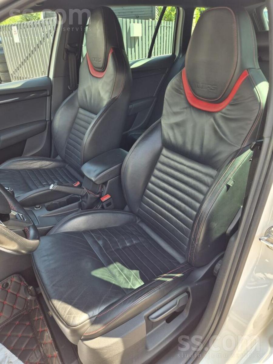 White Skoda Octavia 2014 in Riga, with an engine capacity of 2.00 L and mileage of 231 thousand km for 9990 €, photo 13 on AUTOMOTO.COM.LV