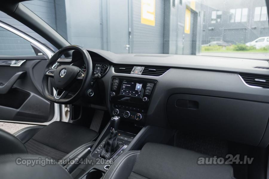 White Skoda Octavia 2014 in Tallinn, with an engine capacity of 2.00 L and mileage of 240 thousand km for 7999 €, photo 7 on AUTOMOTO.COM.LV