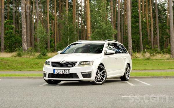 White Skoda Octavia 2014 in Riga, with an engine capacity of 2.00 L and mileage of 231 thousand km for 9990 €, photo 4 on AUTOMOTO.COM.LV