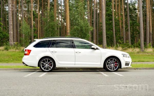 White Skoda Octavia 2014 in Riga, with an engine capacity of 2.00 L and mileage of 231 thousand km for 9990 €, photo 9 on AUTOMOTO.COM.LV