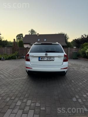 White Skoda Octavia 2014 in Riga, with an engine capacity of 2.00 L and mileage of 223 thousand km for 6500 €, photo 7 on AUTOMOTO.COM.LV