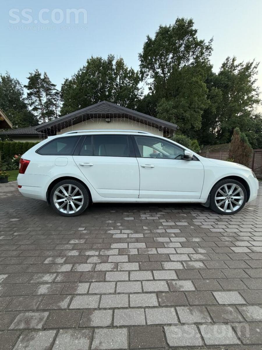 White Skoda Octavia 2014 in Riga, with an engine capacity of 2.00 L and mileage of 223 thousand km for 6500 €, photo 9 on AUTOMOTO.COM.LV