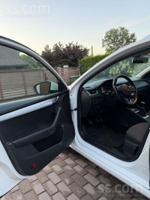 White Skoda Octavia 2014 in Riga, with an engine capacity of 2.00 L and mileage of 223 thousand km for 6500 €, photo 11 on AUTOMOTO.COM.LV