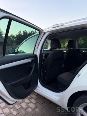 White Skoda Octavia 2014 in Riga, with an engine capacity of 2.00 L and mileage of 223 thousand km for 6500 €, photo 13 on AUTOMOTO.COM.LV