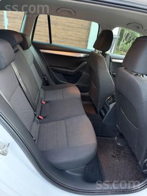White Skoda Octavia 2014 in Riga, with an engine capacity of 2.00 L and mileage of 223 thousand km for 6500 €, photo 14 on AUTOMOTO.COM.LV