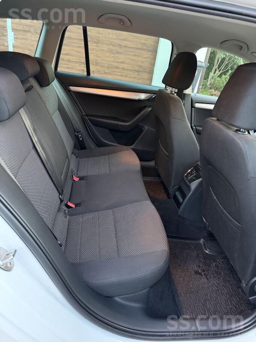 White Skoda Octavia 2014 in Riga, with an engine capacity of 2.00 L and mileage of 223 thousand km for 6500 €, photo 14 on AUTOMOTO.COM.LV