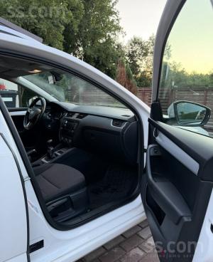 White Skoda Octavia 2014 in Riga, with an engine capacity of 2.00 L and mileage of 223 thousand km for 6500 €, photo 17 on AUTOMOTO.COM.LV