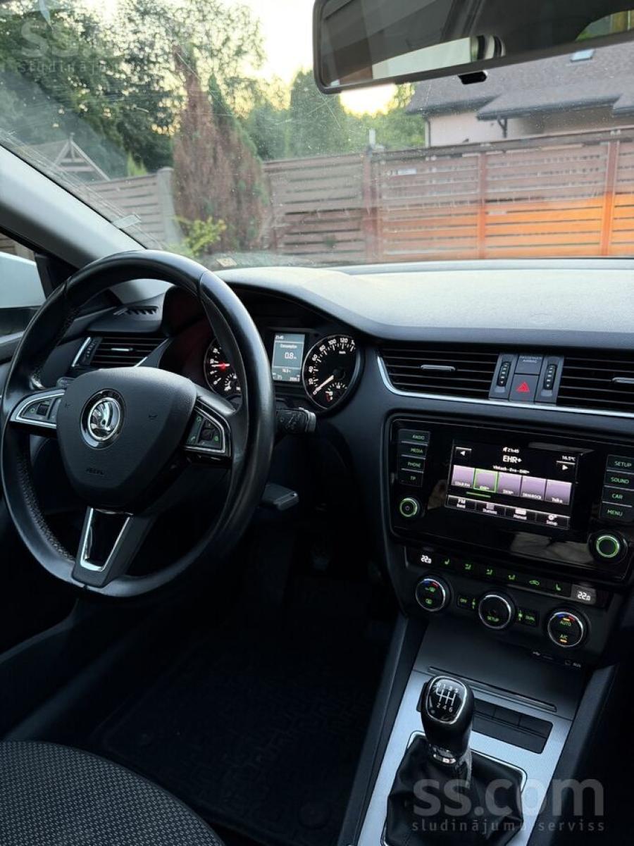 White Skoda Octavia 2014 in Riga, with an engine capacity of 2.00 L and mileage of 223 thousand km for 6500 €, photo 19 on AUTOMOTO.COM.LV