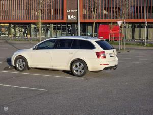 White Skoda Octavia 2014 in Klaipeda, with an engine capacity of 1.60 L and mileage of 390 thousand km for 4800 €, photo 4 on AUTOMOTO.COM.LV