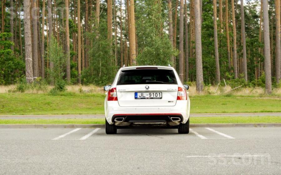 White Skoda Octavia 2014 in Riga, with an engine capacity of 2.00 L and mileage of 231 thousand km for 9190 €, photo 7 on AUTOMOTO.COM.LV