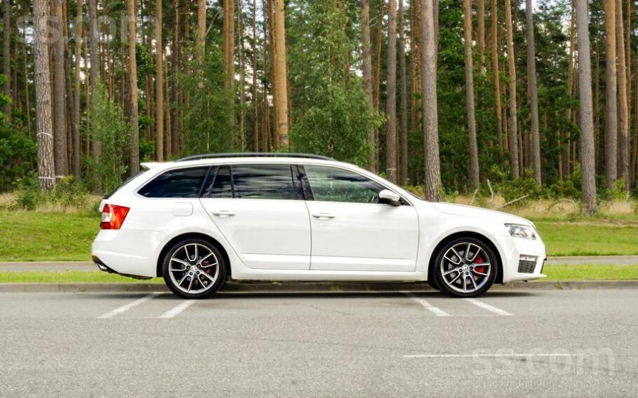 White Skoda Octavia 2014 in Riga, with an engine capacity of 2.00 L and mileage of 231 thousand km for 9190 €, photo 9 on AUTOMOTO.COM.LV