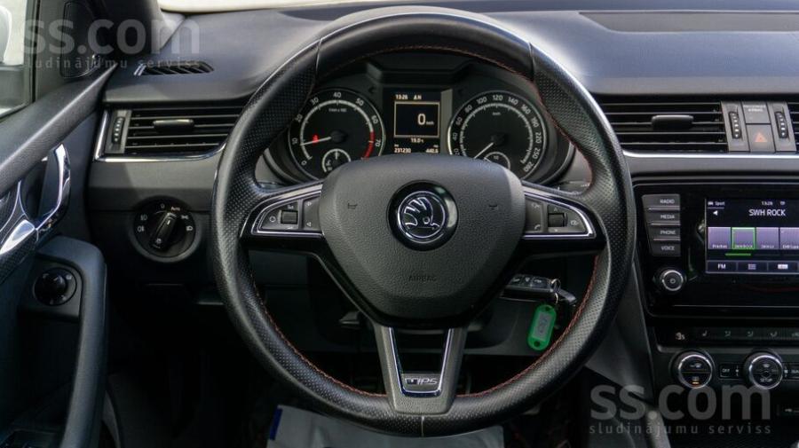 White Skoda Octavia 2014 in Riga, with an engine capacity of 2.00 L and mileage of 231 thousand km for 9190 €, photo 14 on AUTOMOTO.COM.LV