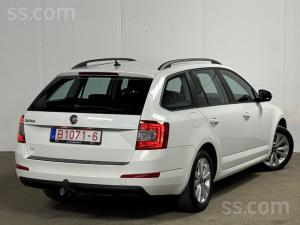 White Skoda Octavia 2014 in Jurmala, with an engine capacity of 1.60 L and mileage of 287 thousand km for 6850 €, photo 14 on AUTOMOTO.COM.LV