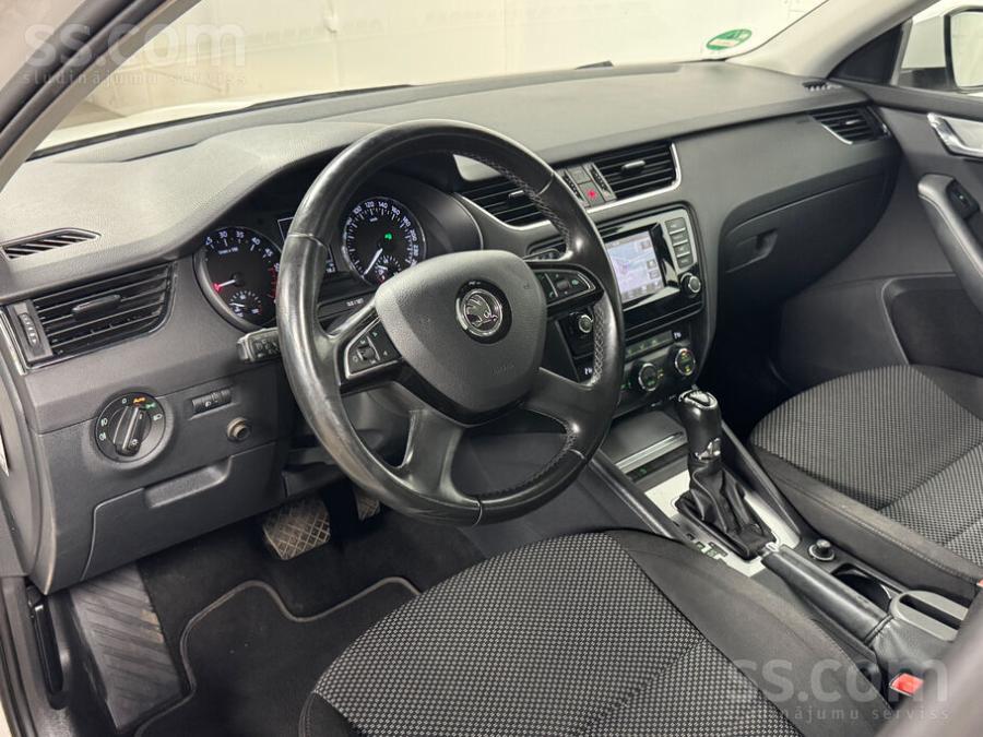 White Skoda Octavia 2014 in Jurmala, with an engine capacity of 1.60 L and mileage of 287 thousand km for 6850 €, photo 16 on AUTOMOTO.COM.LV