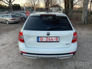 White Skoda Octavia 2015 in Riga, with an engine capacity of 2.00 L and mileage of 257 thousand km for 10890 €, photo 4 on AUTOMOTO.COM.LV