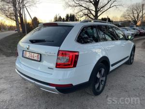 White Skoda Octavia 2015 in Riga, with an engine capacity of 2.00 L and mileage of 257 thousand km for 10890 €, photo 5 on AUTOMOTO.COM.LV